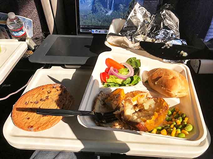 Train meals served with a side of mountain views beat airplane peanuts by roughly a million miles, give or take.