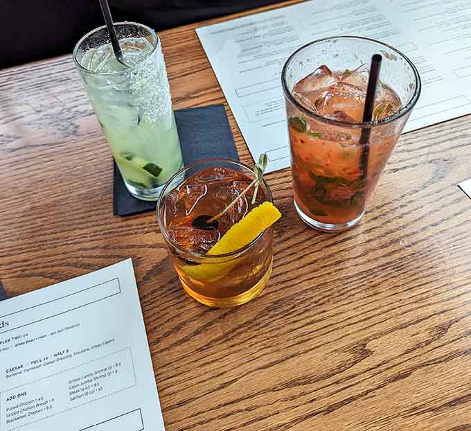 A colorful flight of craft cocktails awaits, each one more Instagram-worthy than the last and infinitely more delicious than they look.