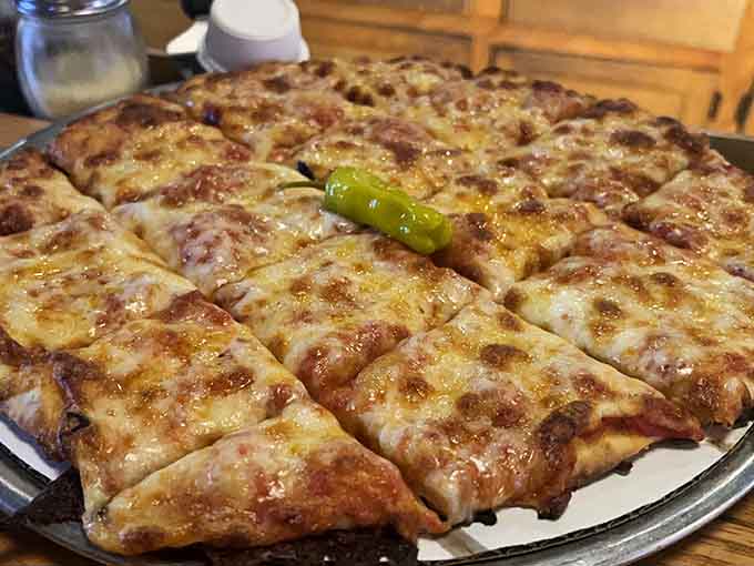 Tavern pizza done right, with generous toppings and that perfect cheese pull you live for.
