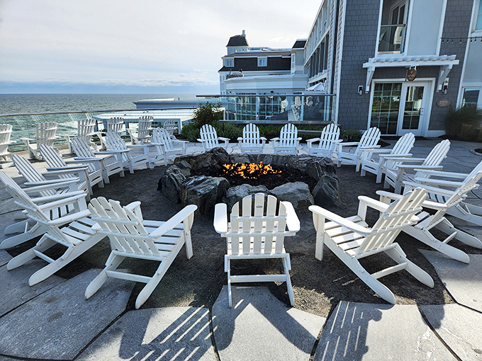 Gather 'round the fire as day turns to night, where conversations flow as freely as the Atlantic below.