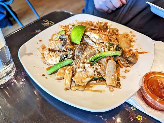Pad Thai done right is culinary poetry &ndash; each bite a perfect verse of noodles, egg, peanuts, and lime. This plate deserves its own standing ovation!