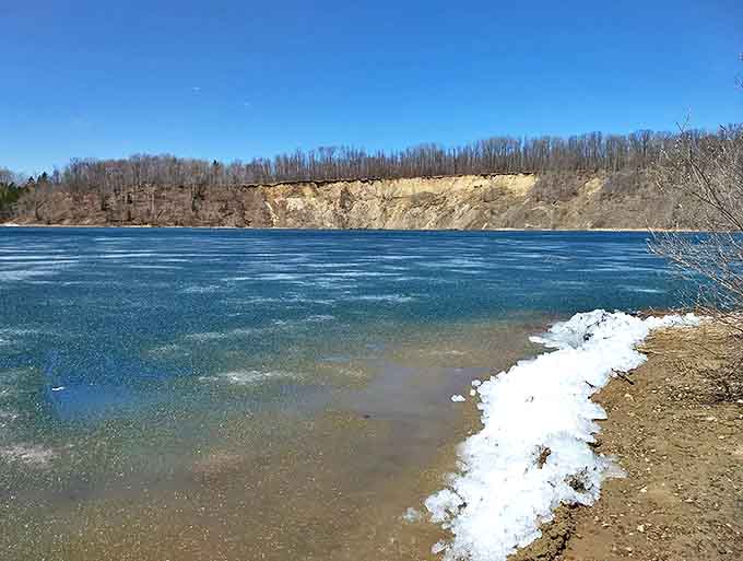 Winter's icy fingers can't diminish the striking blue beneath &ndash; even partially frozen, Tioga's waters maintain their mesmerizing hue.