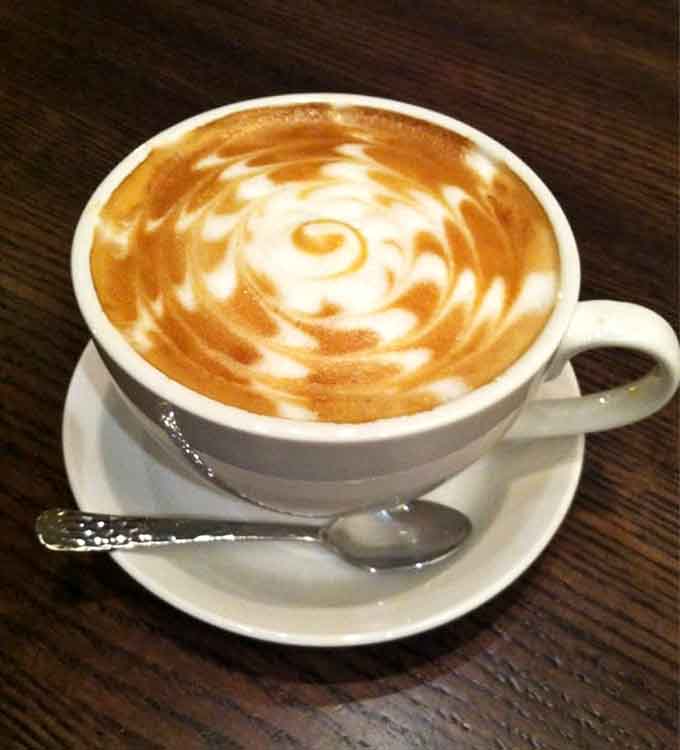 That latte art suggests someone actually cares about your coffee experience, not just caffeinating you and moving on.