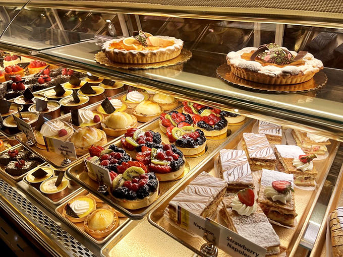 The pastry case looks like a museum exhibit where you're actually encouraged to touch, or rather, devour the art.