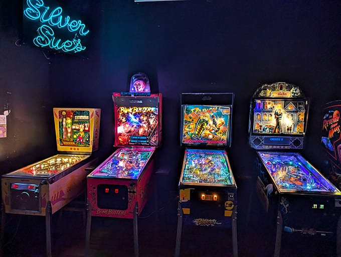 Each machine represents a chapter in pinball's evolution, from simple mechanics to complex multi-ball madness.
