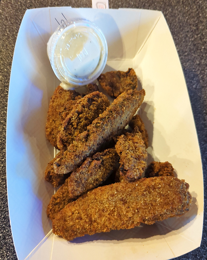 Earth meets fryer in perfect harmony. These golden-brown mushroom morsels prove Joe's magic extends beyond the aquatic realm.