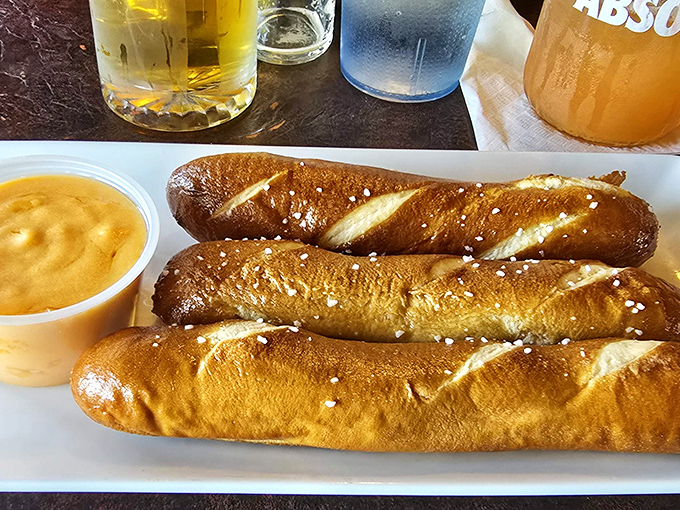 Soft pretzel bites with beer cheese sauce – the appetizer that's started more "just one more" negotiations than any dish in Illinois.