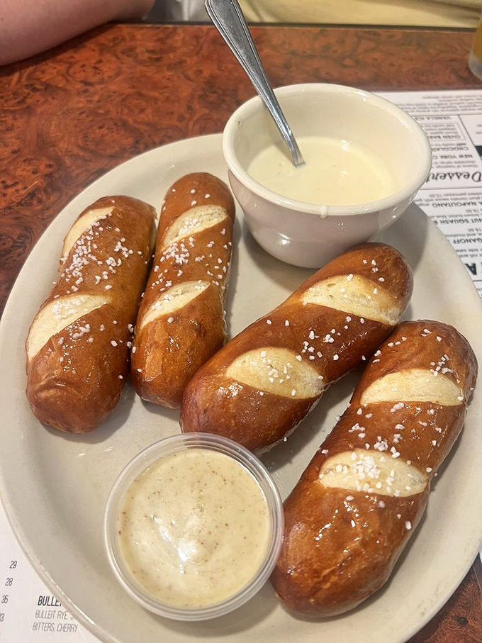 Pretzel sticks that would make Bavaria proud, served with dipping sauces worth fighting over. Sharing not recommended.