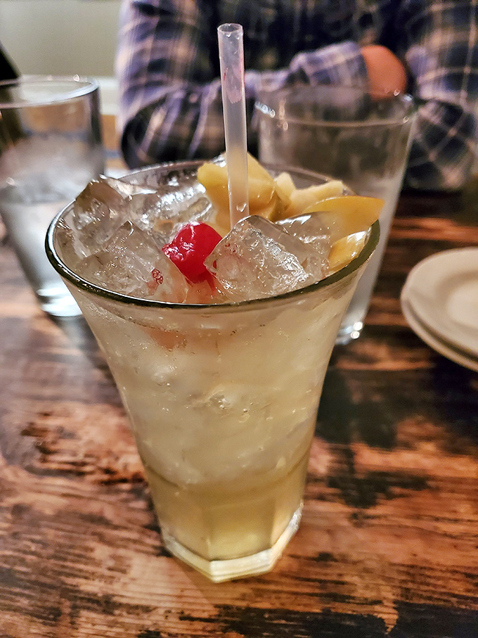 Summer in a glass, this signature cocktail with floating fruit treasures is dangerously refreshing and deceptively potent.