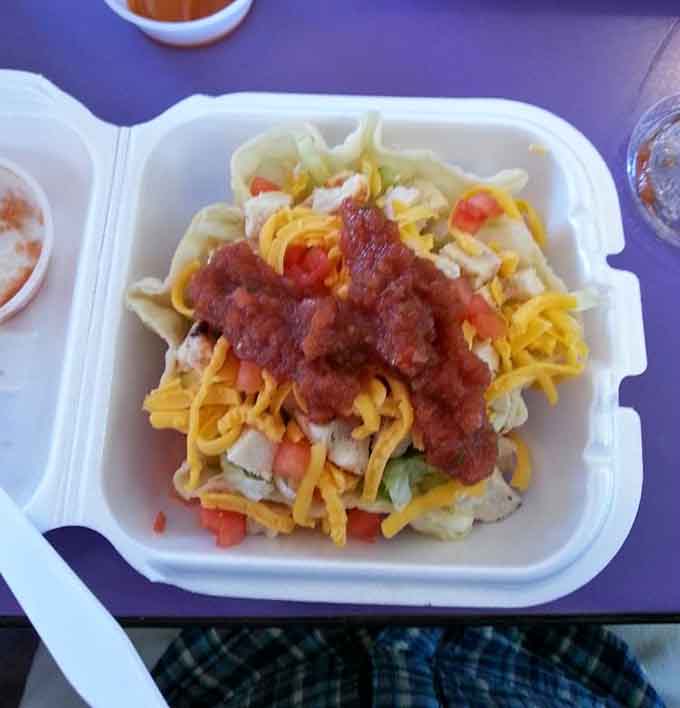 The mini chicken salad packs fresh ingredients and generous toppings into a perfectly portable package for lighter appetites or sensible eaters.