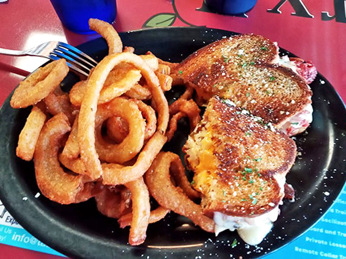 The legendary Reuben arrives with a mountain of onion rings – a combination that has launched countless food pilgrimages to this unassuming café.