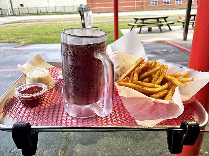 The holy quartet of drive-in dining &ndash; a frosty mug of root beer alongside crispy fries and creamy slaw.