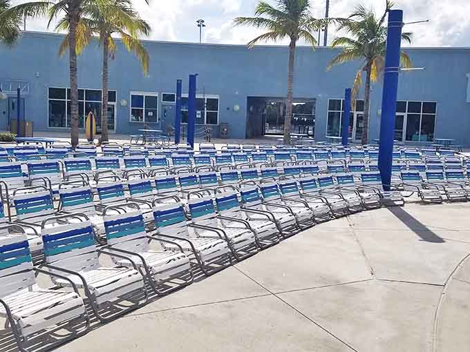 The unsung heroes of water parks: rows of lounge chairs waiting patiently for tired swimmers and vigilant parents clutching novels and sunscreen.
