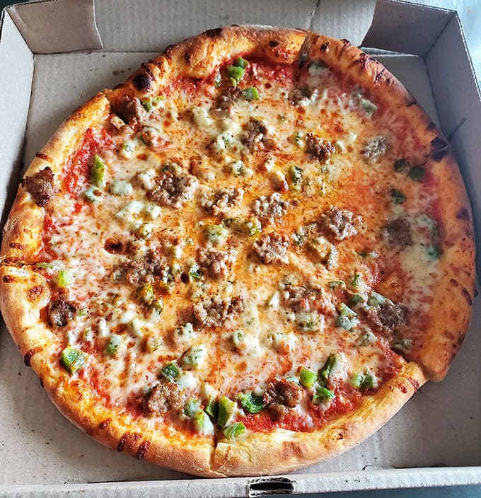 Sausage and peppers on a perfectly blistered crust &ndash; the kind of pizza that makes you wonder why you'd ever order anything else.