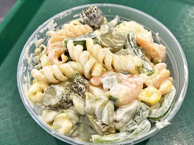 Pasta salad elevated from sad side dish to star attraction, with each bite delivering a perfect balance of flavors.