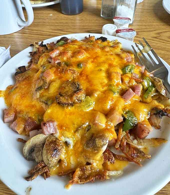 The Skillet doesn't just feed you &ndash; it entertains with its sizzling presentation and satisfies with layers of potatoes, eggs, ham, and vegetables.