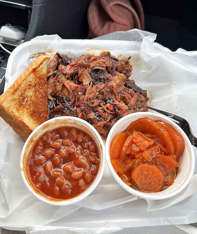 Pulled pork paired with classic sides creates a plate that would make any Southern grandmother nod in approval.