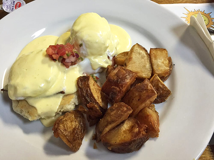 Southern Benedict with golden potatoes&mdash;where traditional eggs Benedict meets Southern comfort and everybody wins.