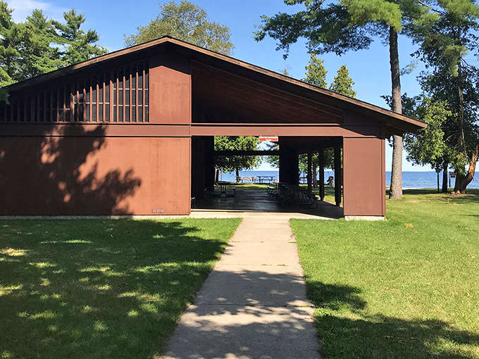 The park's open-air pavilion offers shelter from sudden summer showers while keeping that connection to the surrounding beauty.
