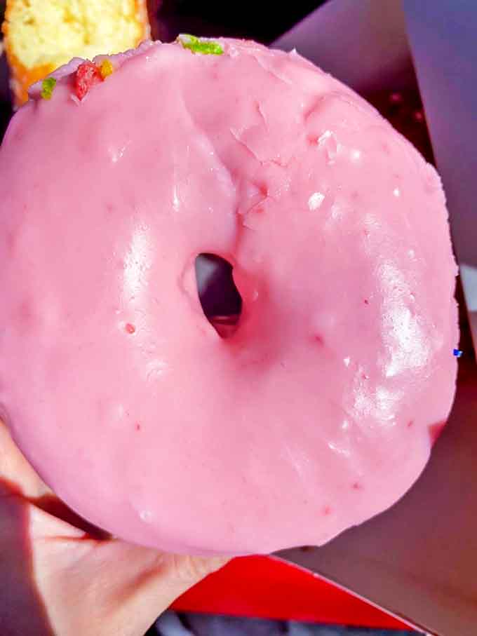 Wearing pink with confidence &ndash; this donut doesn't care if you think it's too bright for breakfast, it knows its worth.