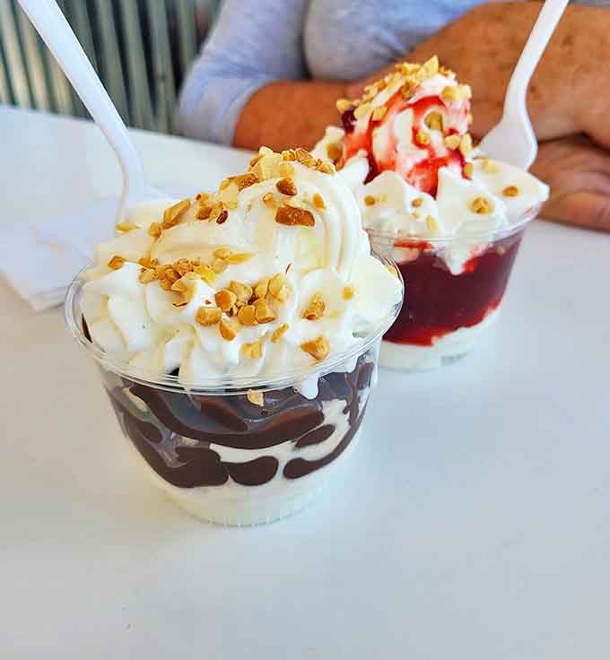 These parfaits aren't just desserts, they're edible architecture &ndash; layers of soft serve, sauce, and crunchy toppings that deserve a moment of admiration before demolition.