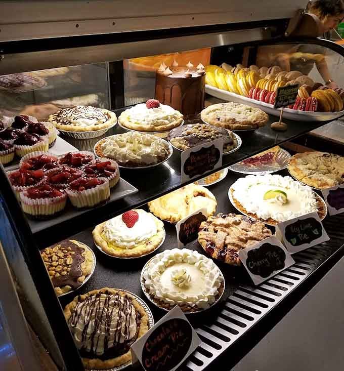 The pastry case displays enough baked temptation to make even the most disciplined dieter reconsider their life choices completely.