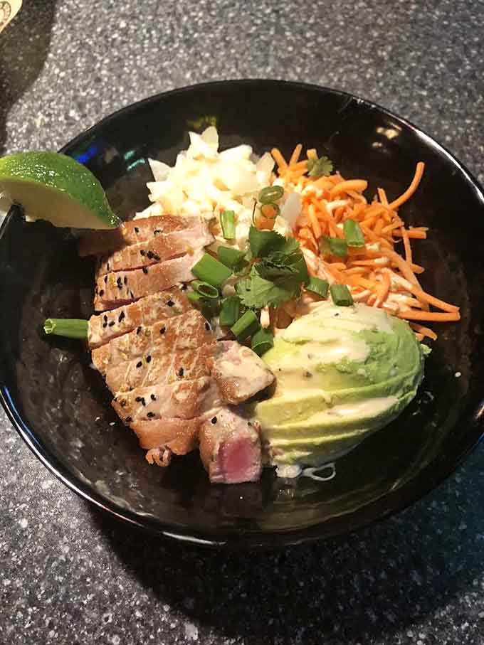 This poke bowl shows impressive range, bringing fresh, healthy options to a menu known for indulgence.