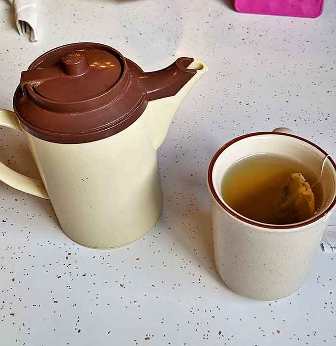 Tea service at Suomi comes with no pretension, just honest warmth in a classic brown-and-cream pot that feels like grandma's kitchen.