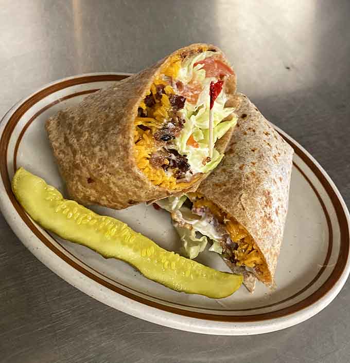 Wrapped, griddled, and stuffed with breakfast joy, this burrito understands that portability shouldn't mean sacrificing flavor or substance.
