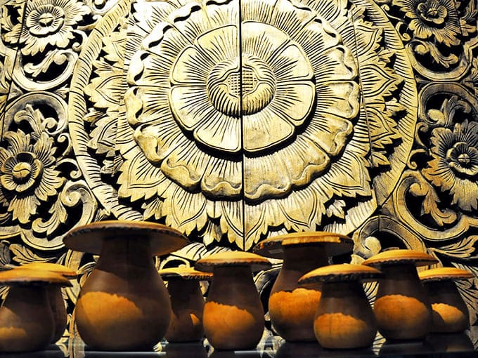 Those hand-carved details and golden flourishes represent hours of artisan work, the kind of craftsmanship that makes mass-produced furniture weep.