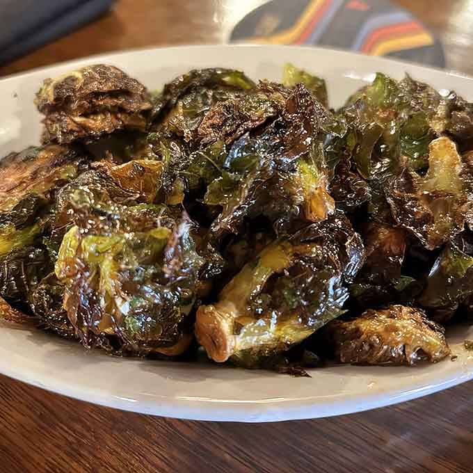 Brussels sprouts get the Sriracha treatment they deserve, emerging crispy and caramelized like vegetable candy for grown-ups.
