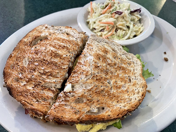 A sandwich so perfectly toasted it makes other sandwiches feel inadequate &ndash; served with a side of coleslaw for moral support.