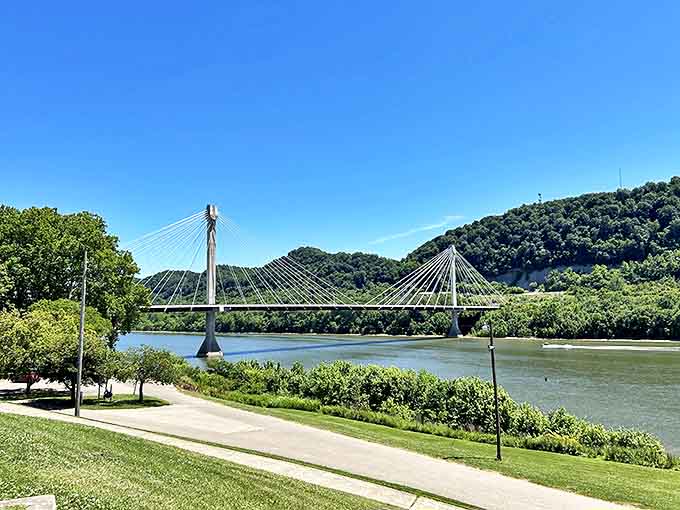 The U.S. Grant Bridge stretches across the Ohio River with elegant suspension cables, connecting states and offering postcard-worthy views in every direction.