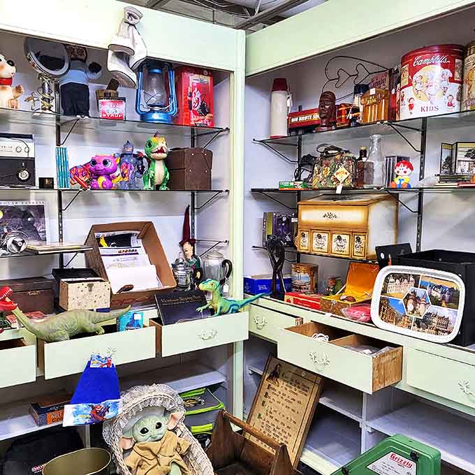 Vintage dolls with knowing eyes and well-loved teddy bears wait patiently for new homes, their previous lives of adventure written in every worn patch.