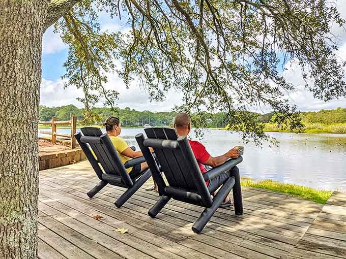 Two readers find literary escape while surrounded by actual escape, proving books and lakes make perfect companions.