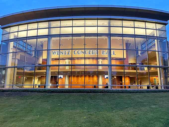 Wentz Concert Hall's gleaming glass facade promises acoustic perfection inside, where music lovers experience everything from symphonies to jazz.