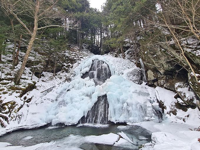 Winter transforms Moss Glen Falls into nature's ice sculpture garden &ndash; the kind of frozen beauty that would make Elsa jealous.