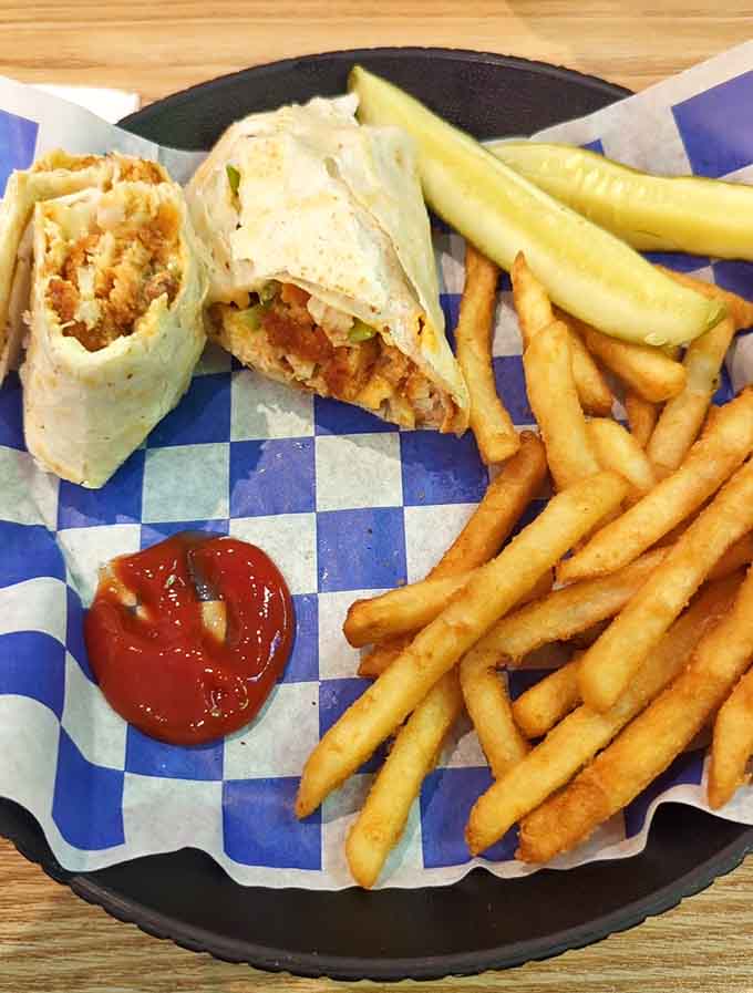 This burrito and fries combo is the kind of meal that makes you understand why breakfast burritos were invented in the first place.