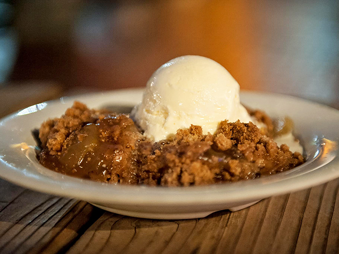 Warm apple cobbler meets cold vanilla ice cream in a dessert showdown where everybody wins, especially your taste buds.