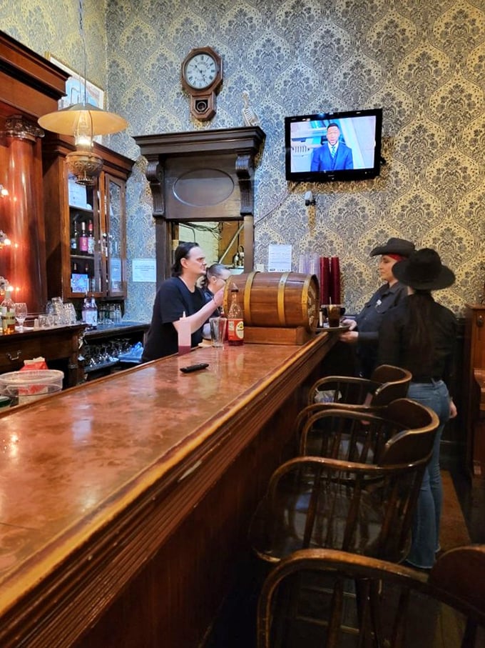 The Silver Dollar Saloon isn't just a waiting area &ndash; it's where stories are shared, friendships formed, and perfectly mixed drinks flow freely.