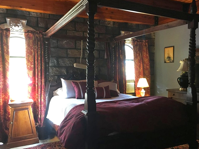 Sleep like royalty in four-poster beds surrounded by stone walls &ndash; medieval luxury with modern comfort.
