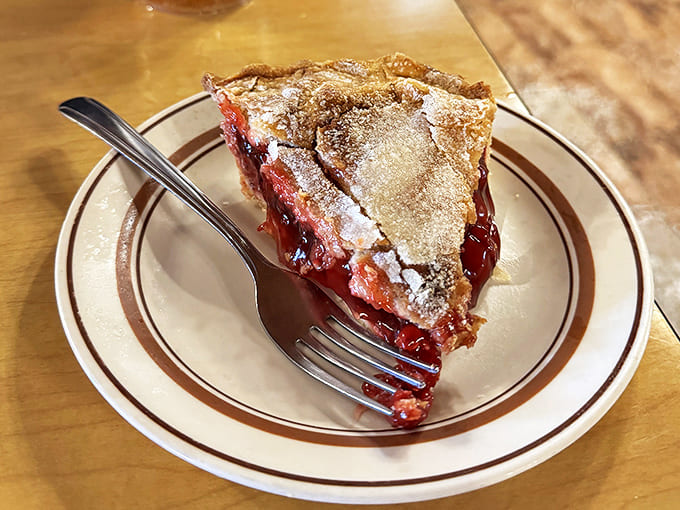 Cherry pie that strikes the perfect balance between sweet and tart, with a crust so flaky it practically shatters at first touch.