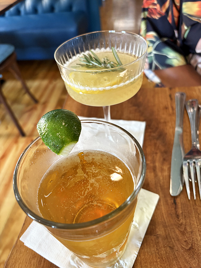 Craft cocktails in proper glassware complement the seafood offerings, with fresh ingredients and quality spirits creating the perfect coastal libation.