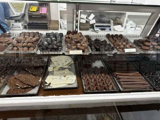 The display case offers a museum-worthy collection of confections that have stood the test of time.