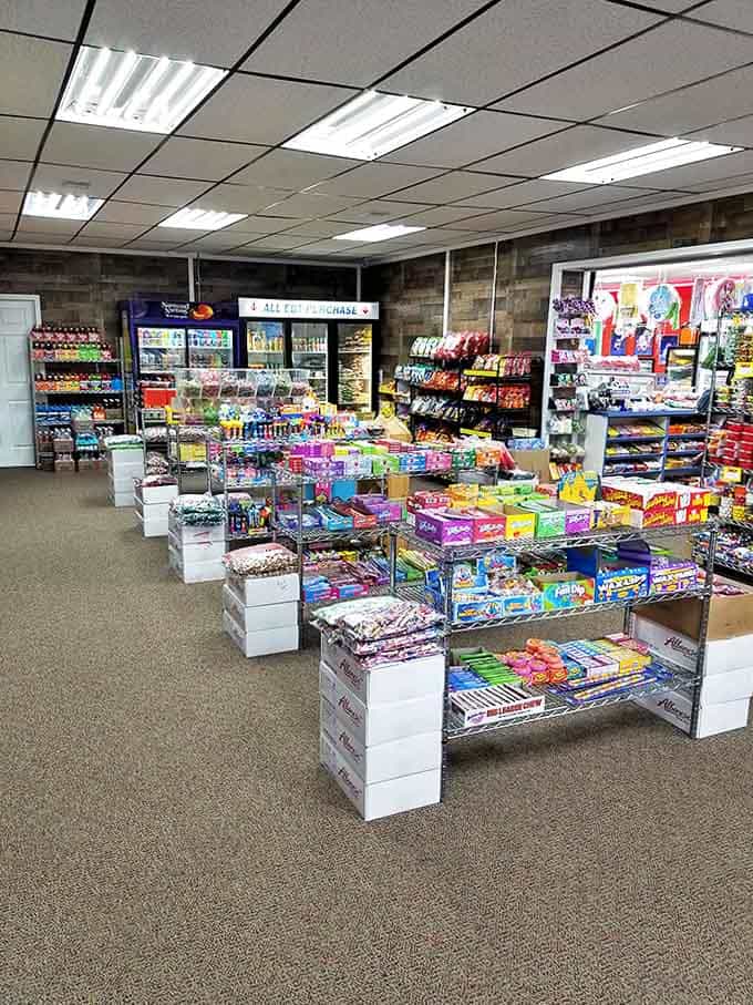 Candy aisles stretch toward infinity, creating a sweet labyrinth where getting lost isn't a problem – it's the entire point of the experience.