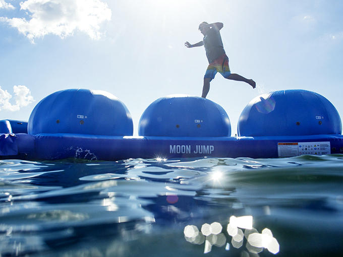 The Moon Jump: because nothing says "I'm having fun" like being temporarily airborne over water with an expression of mild panic.