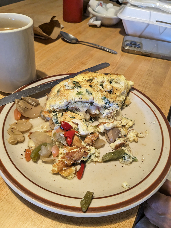 Father's veggie omelet transforms humble eggs into a morning celebration, packed with perfectly saut&eacute;ed vegetables that brighten the day ahead.