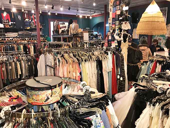 Another angle reveals the store's impressive depth &ndash; racks upon racks creating narrow pathways through fashion history.