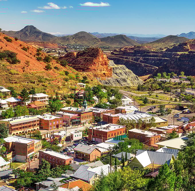 Bisbee clings dramatically to the hillsides, its colorful buildings stacked like a Victorian-era Lego set against the Arizona mountains.