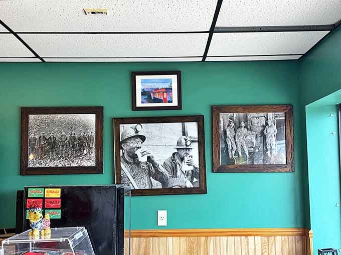 Historical photos of miners and fishing boats line the mint-green walls, connecting today's diners to the pasty's working-class Upper Peninsula roots.